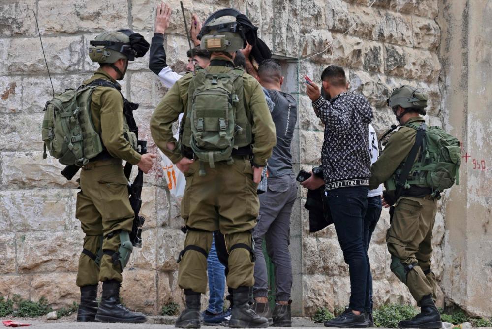 Israeli forces arrest eight Palestinians from Shuafat, northeast of ...